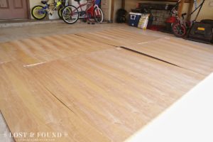 DIY Plywood Plank Flooring and Booth Makeover Reveal - Lost & Found Decor